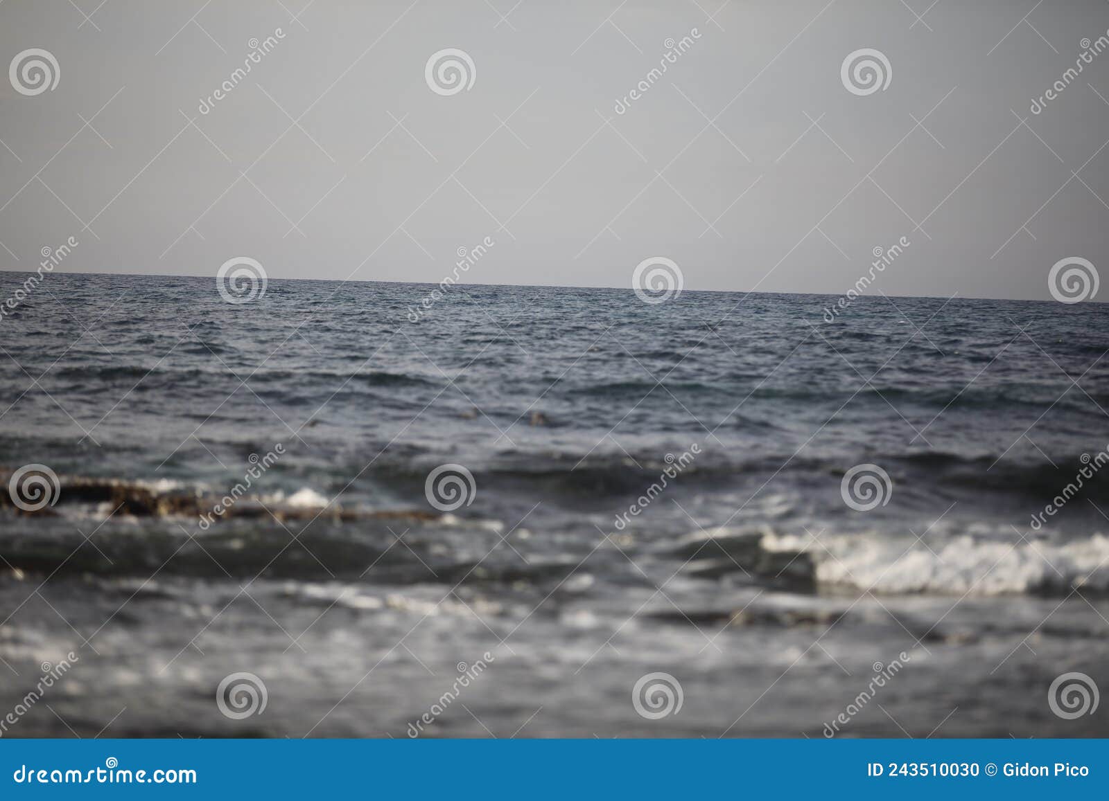 Low Waves on the Shore of a Beach High Quality Stock Photo - Image of ...