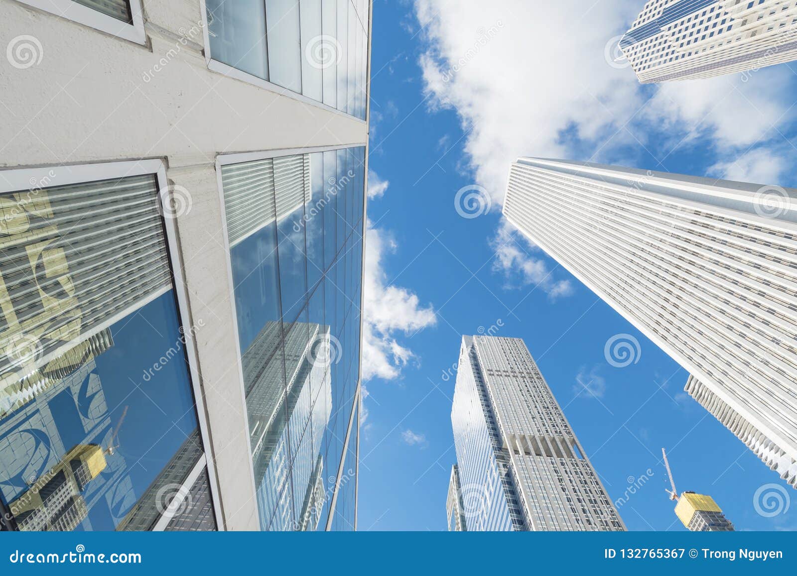 Low Wide Angle View Skyscraper and Building Under Construction I Stock ...