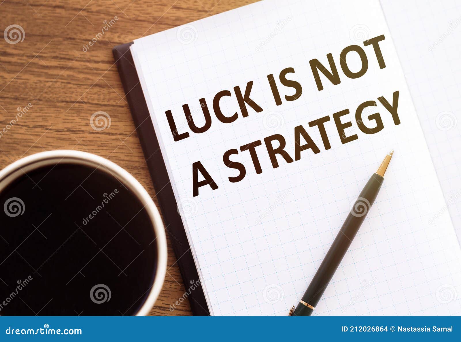 LUCK is NOT a STRATEGY - Text on Notepad on Wooden Desk Stock Photo ...