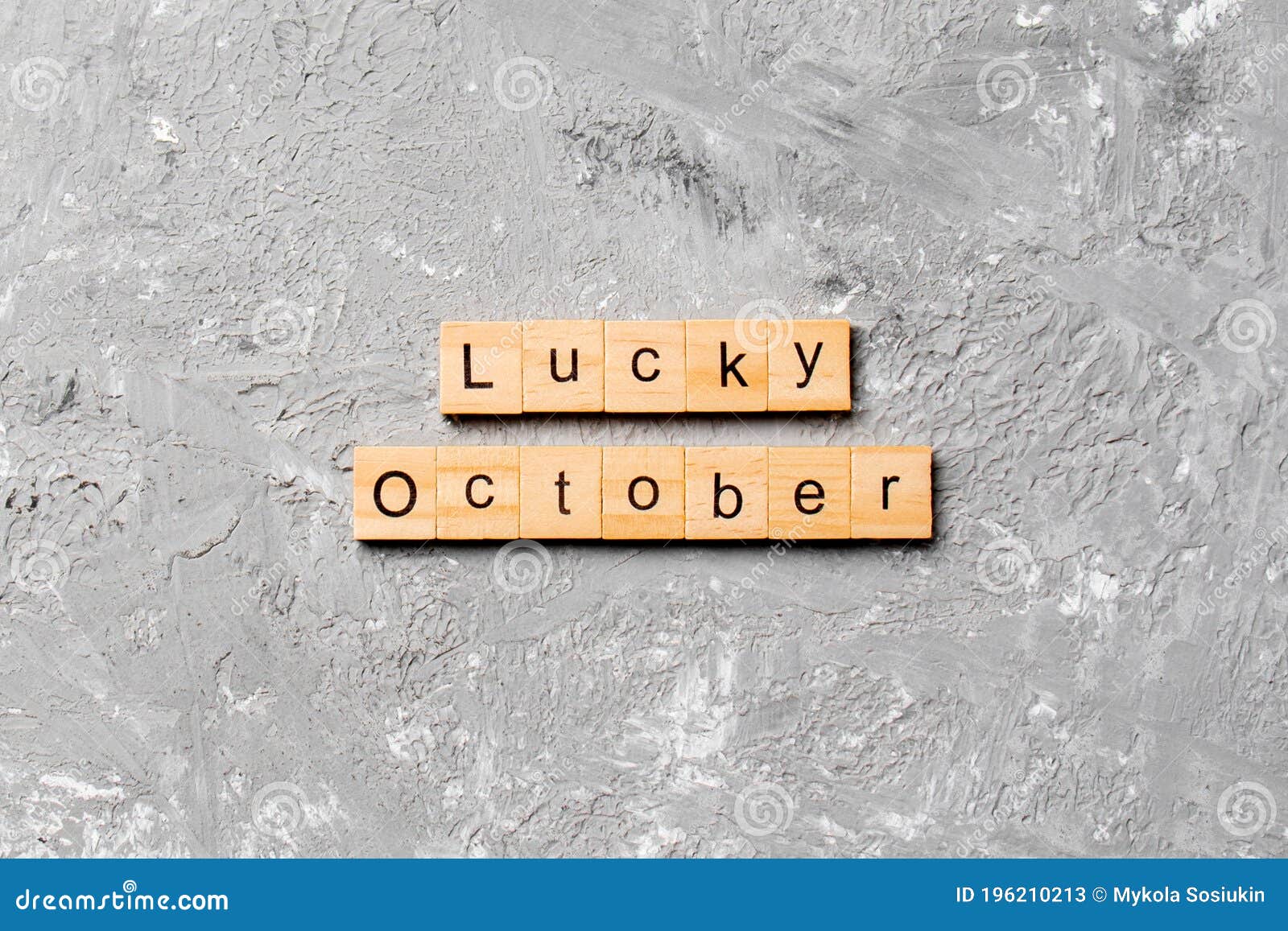 Lucky October Word Written on Wood Block. Lucky October Text on Table ...