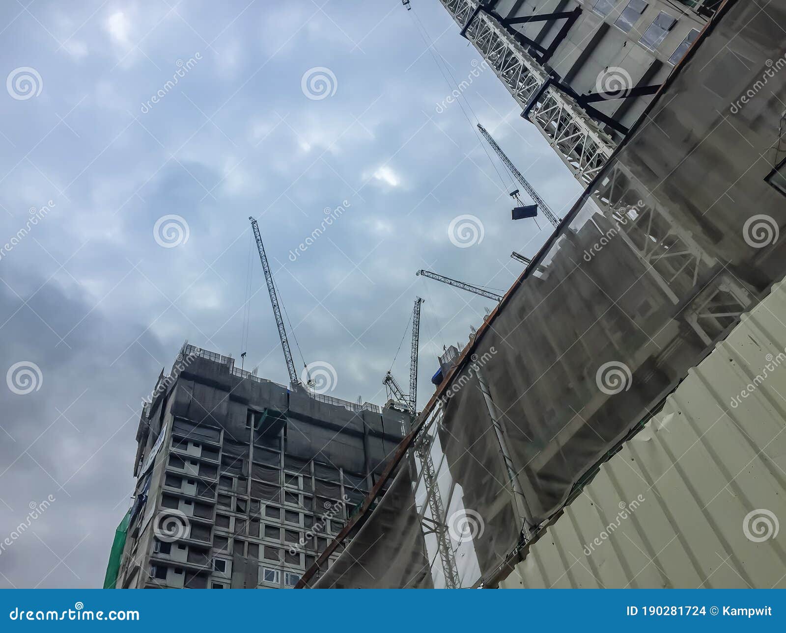 Luffing Jib Tower Crane at High Rise Building Construction Site Project ...