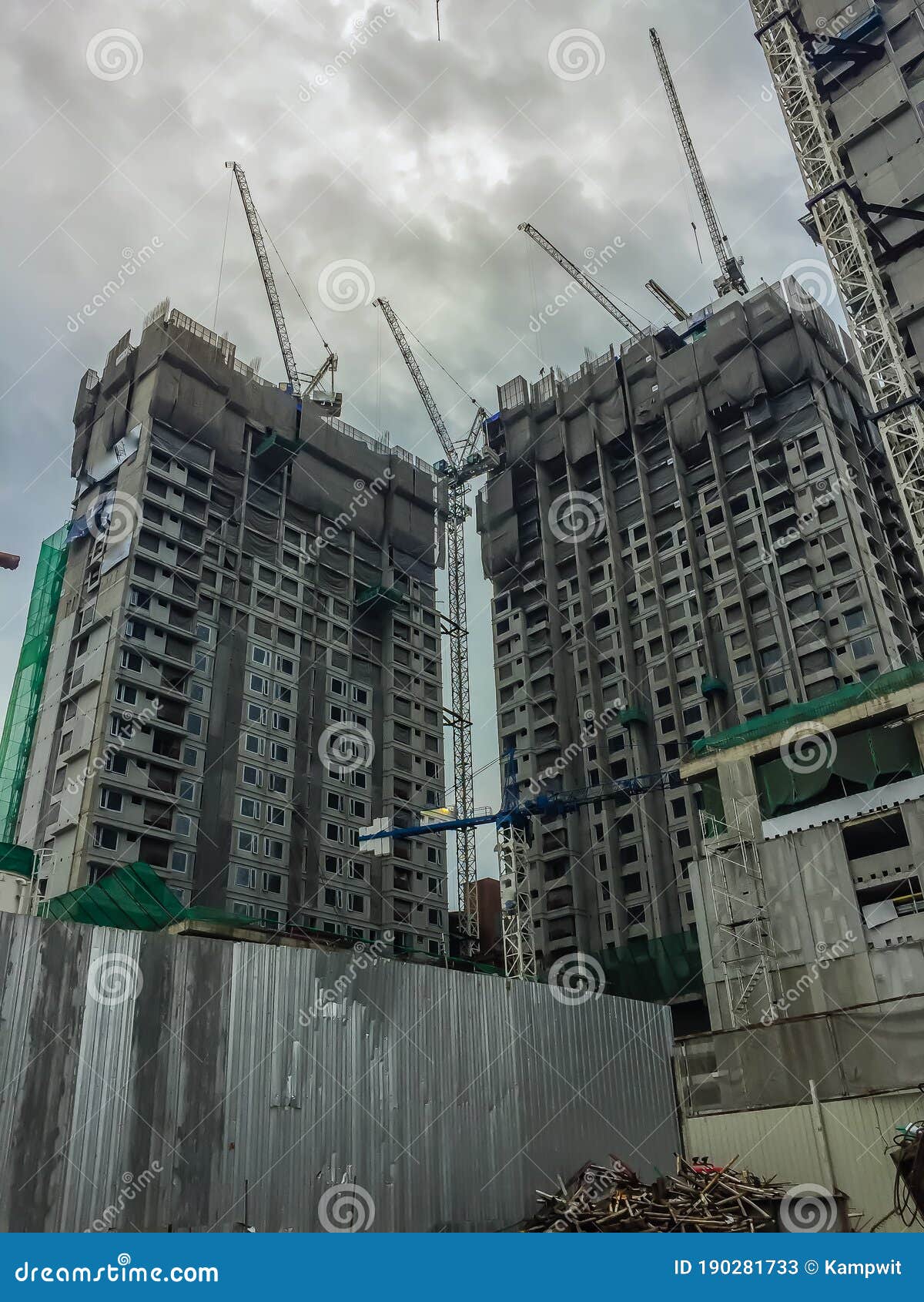 Luffing Jib Tower Crane at High Rise Building Construction Site Project ...