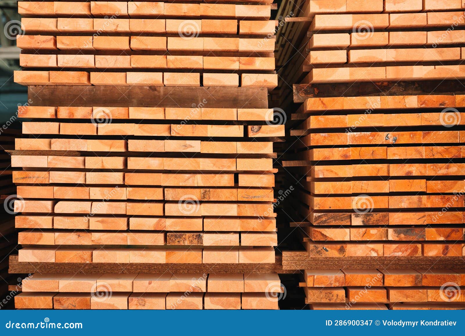 Lumber in a Large Warehouse. Wooden Boards in the Stack Stock Image ...