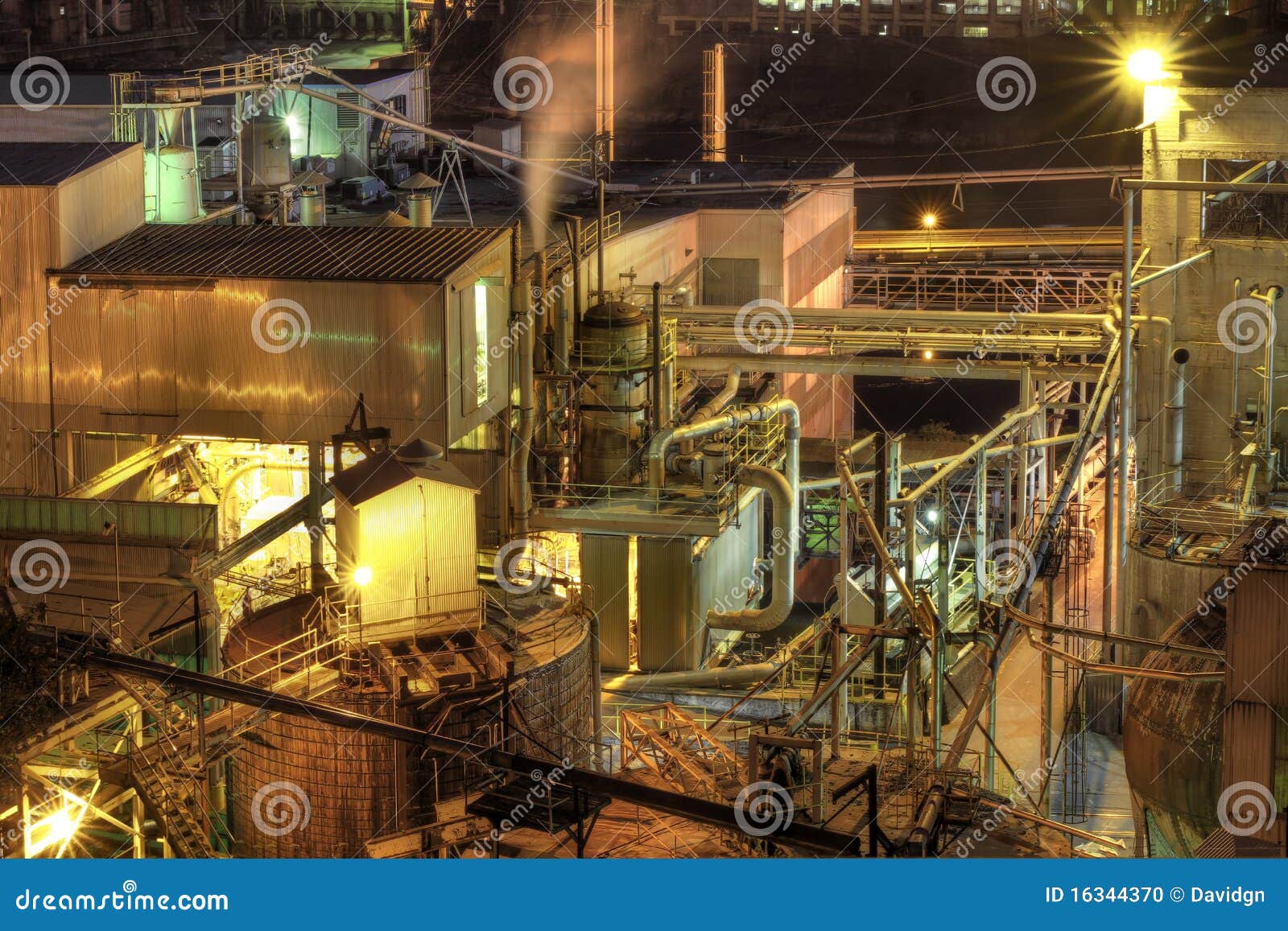 Lumber Paper Mill at Night stock photo. Image of sawdust - 16344370