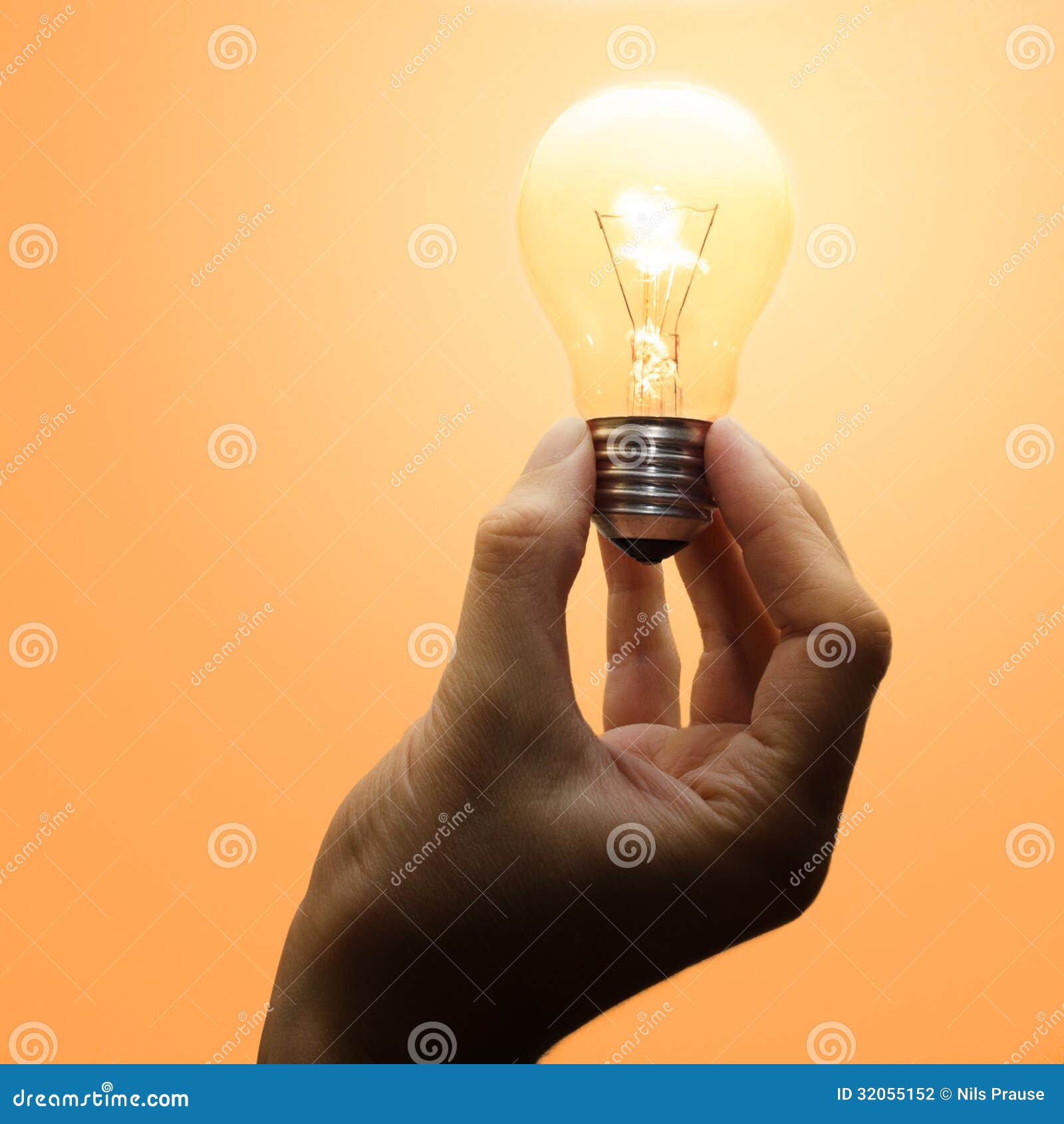 Luminescent Light Bulb in Human Hand Stock Photo - Image of lightbulb ...
