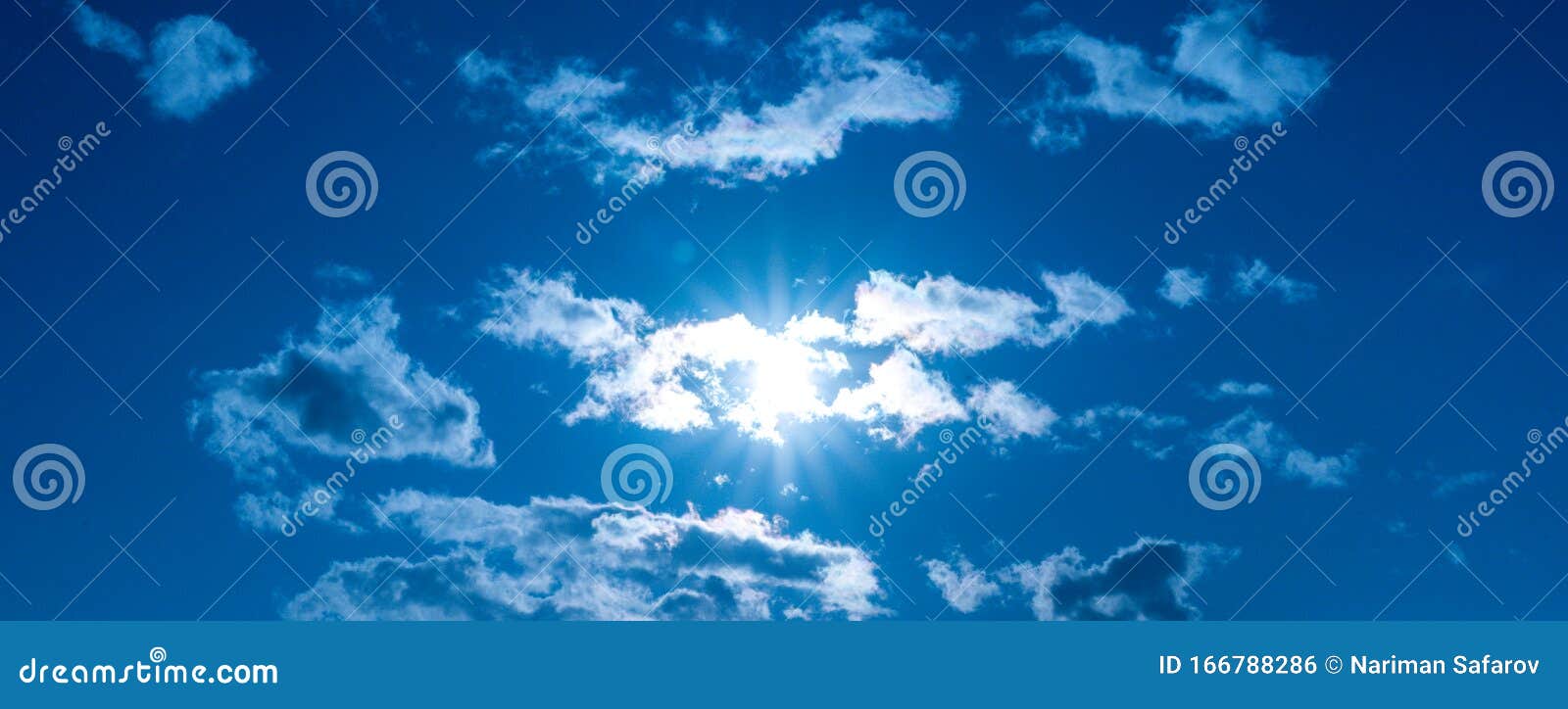 Luminous Sun Surrounded by Clouds Stock Photo - Image of cumulus ...