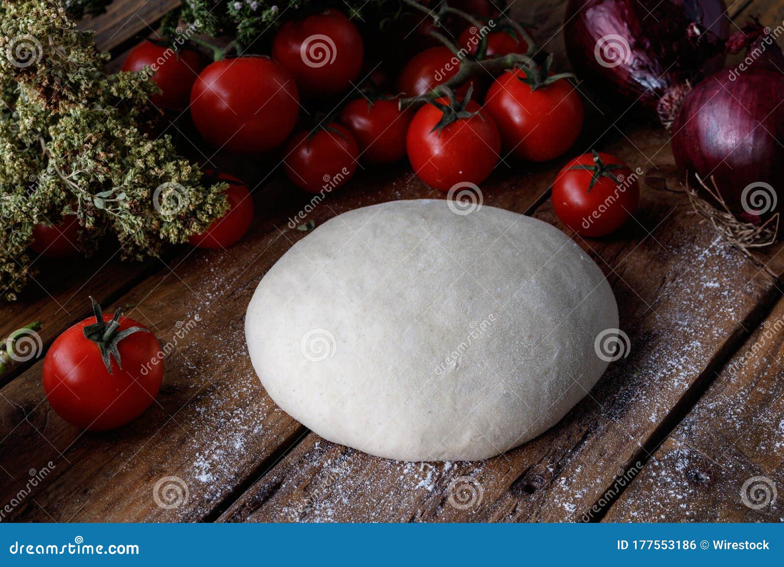 Lump of Dough on a Wooden Table Surrounded with Tomatoes and Onions ...