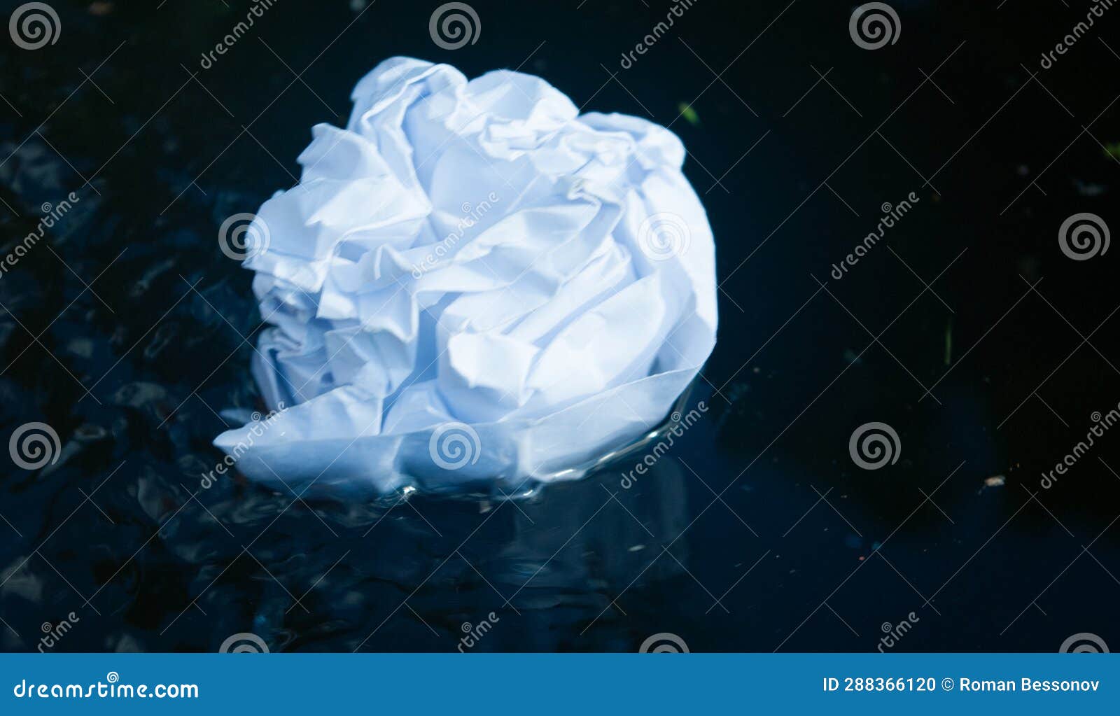 A Lump of Paper Floats in the Water Stock Photo - Image of water, lump ...