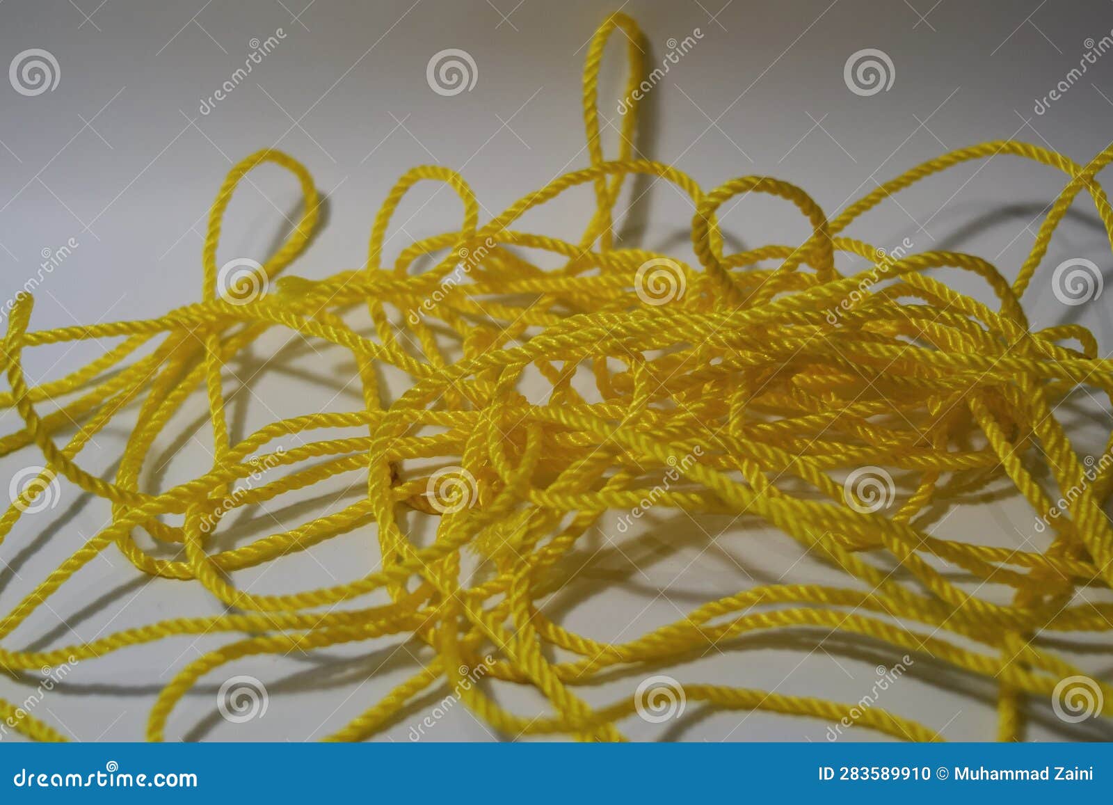 Lump Of Yellow Rope Isolated On White Background. Tangled Rope Stock ...
