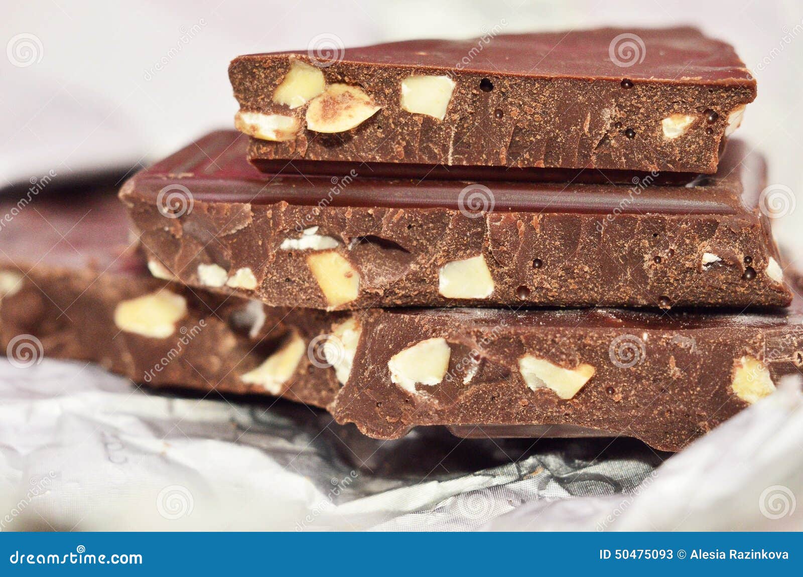 Lumps of Chocolate in Foil stock image. Image of scrap - 50475093