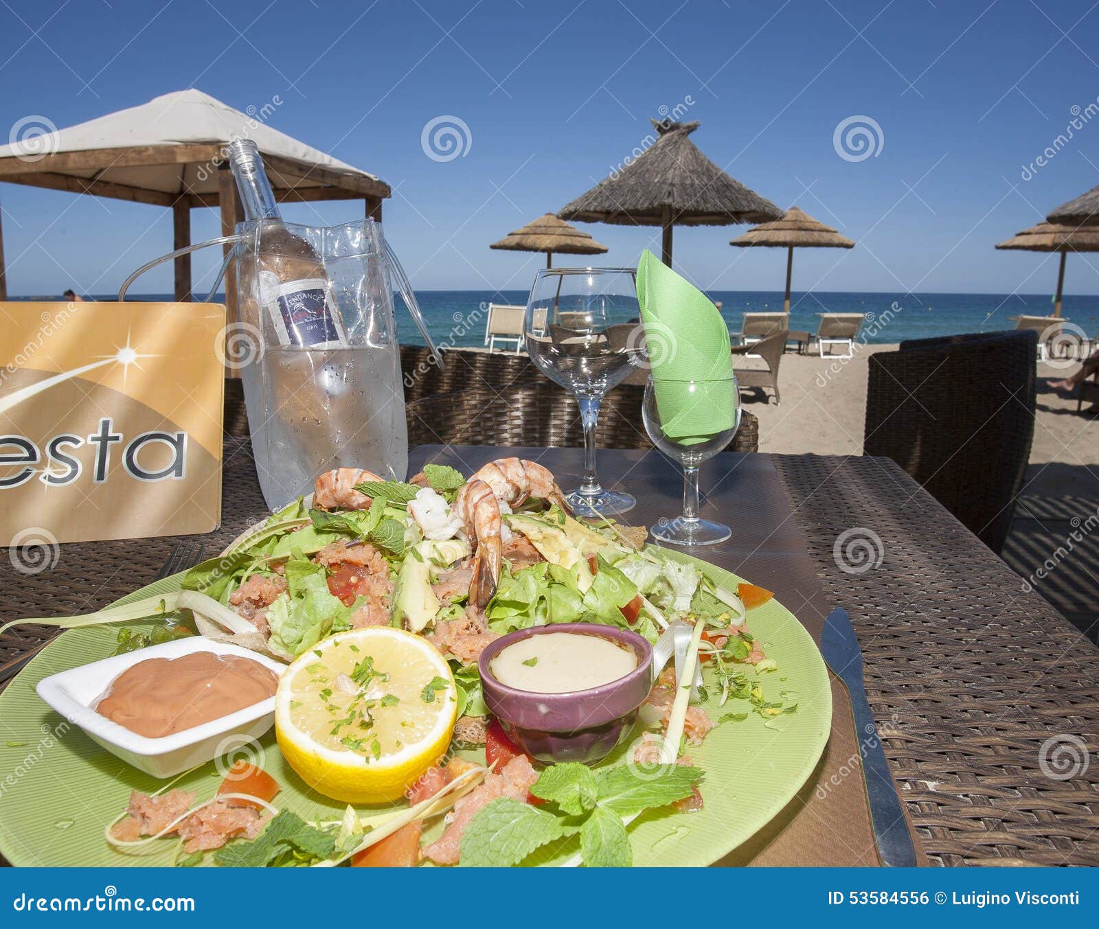 Lunch on the beach stock photo. Image of vegetables, lemon - 53584556