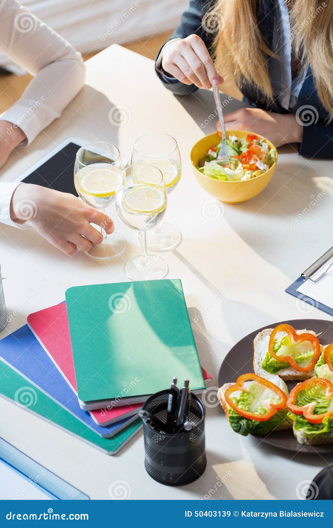 Lunch during meeting stock image. Image of businessman - 50403139