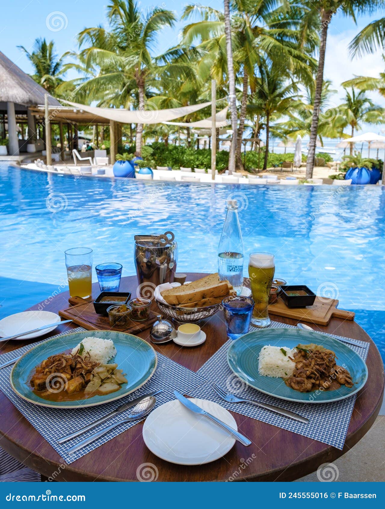 Lunch by a Swimming Pool during Vacation in Mauritius, Tropical Setting ...
