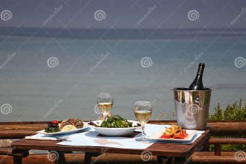 Lunch on a Table for Two at Restaurant Stock Photo - Image of sandy ...
