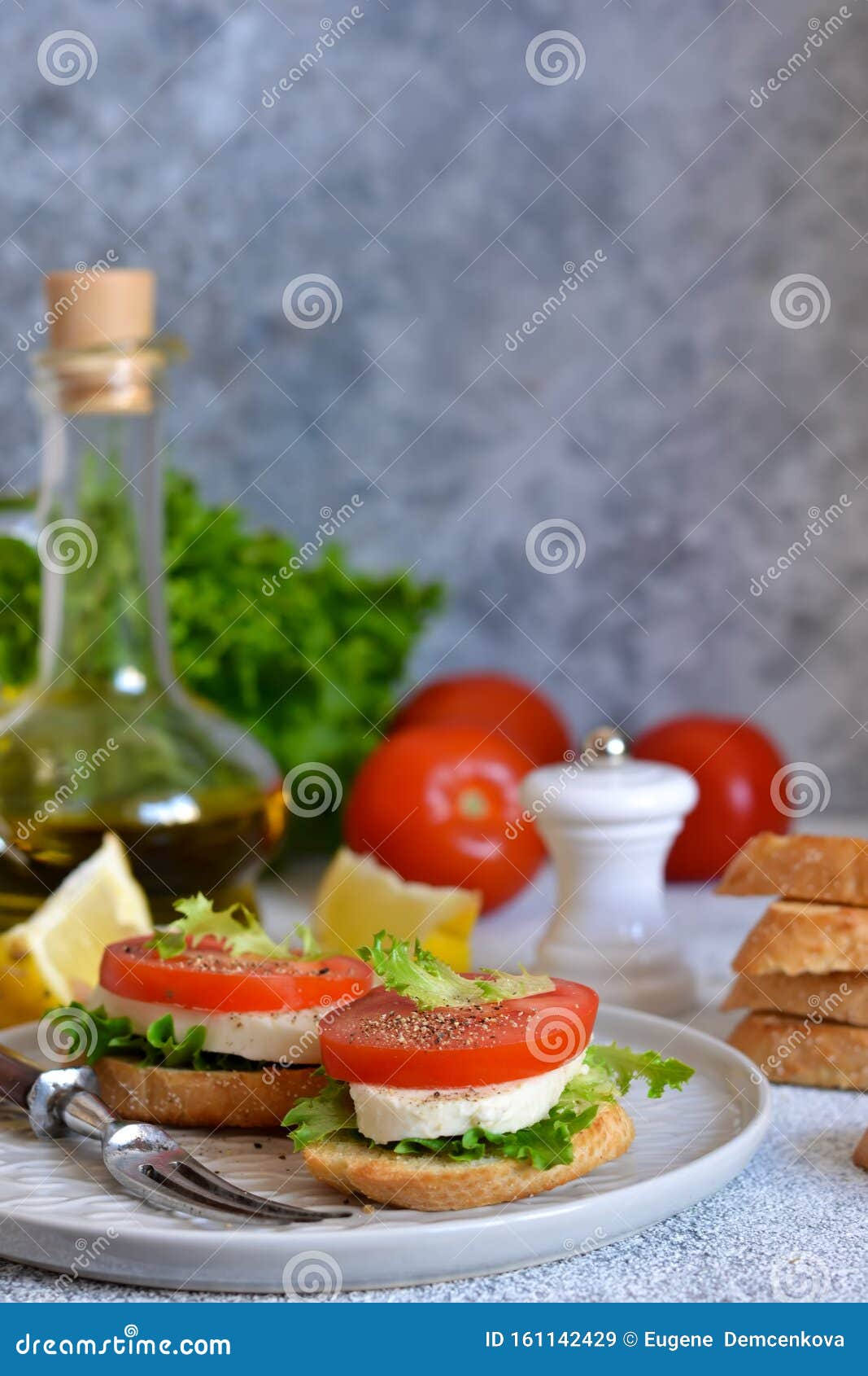 Lunch Time! Sandwich with Tomatoes and Mozzarella on the Kitchen Table ...