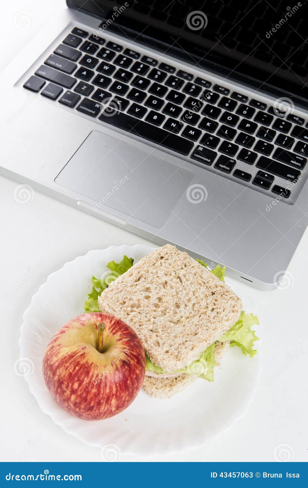 Lunch at work stock image. Image of fruit, laptop, snack - 43457063