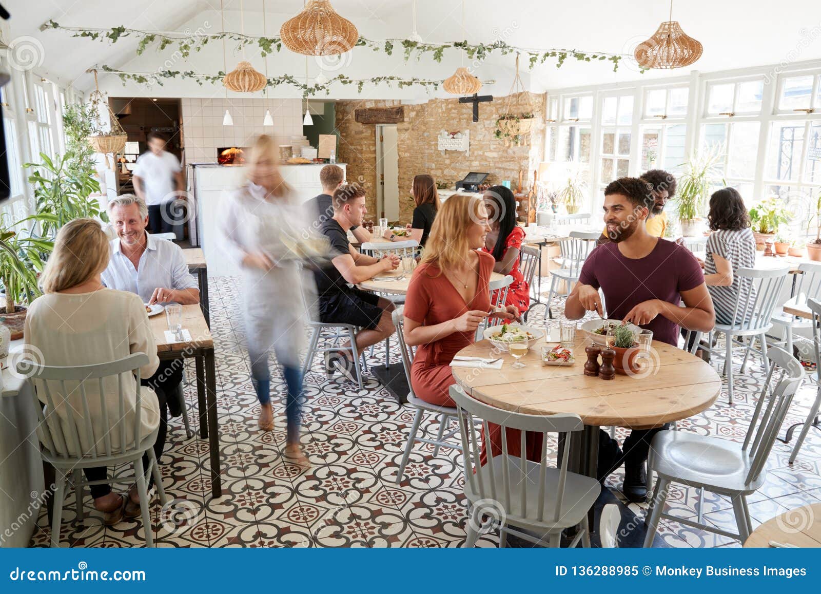 Lunchtime Customers Eating at a Busy Restaurant Stock Image - Image of ...