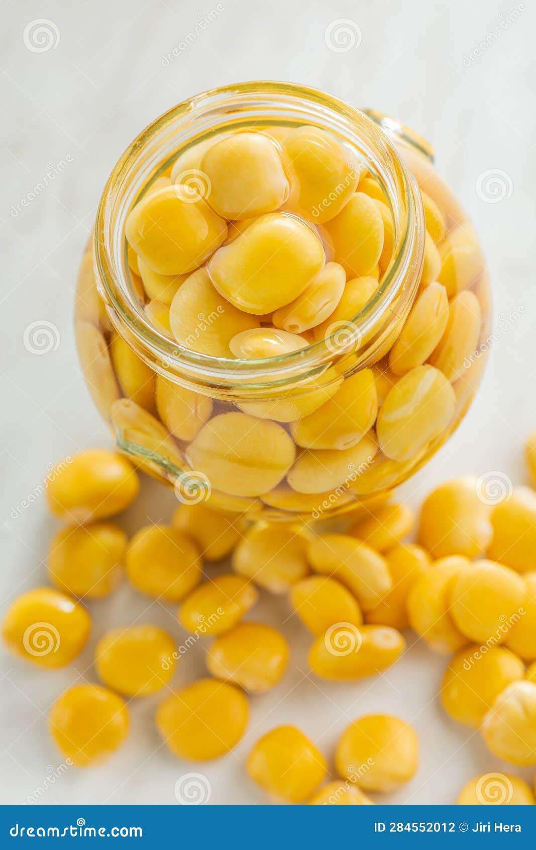 Lupini Beans in Brine. Pickled Lupin in Jar on Kitchen Table Stock ...