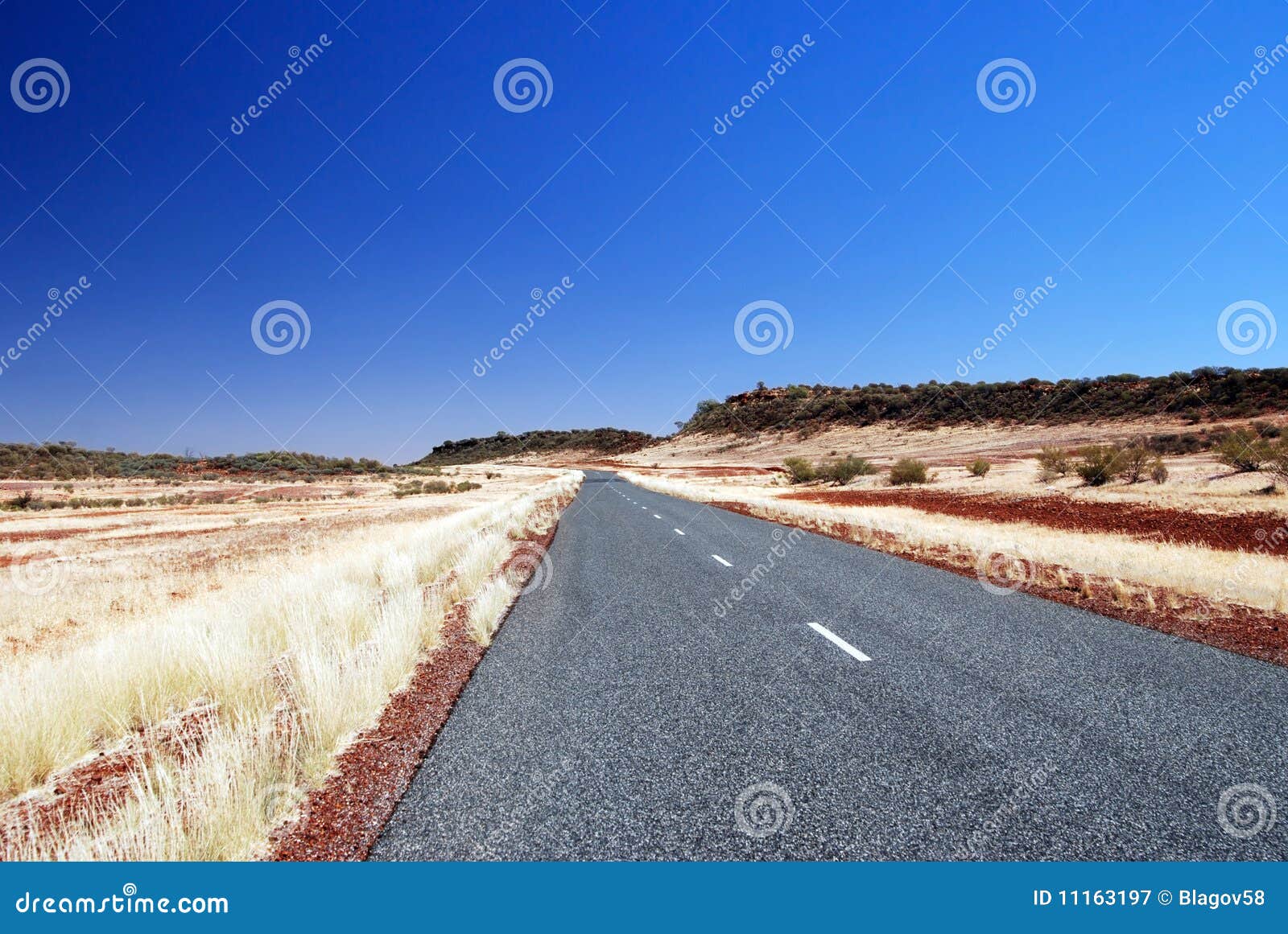 Luritja road stock image. Image of pavement, trip, lined - 11163197