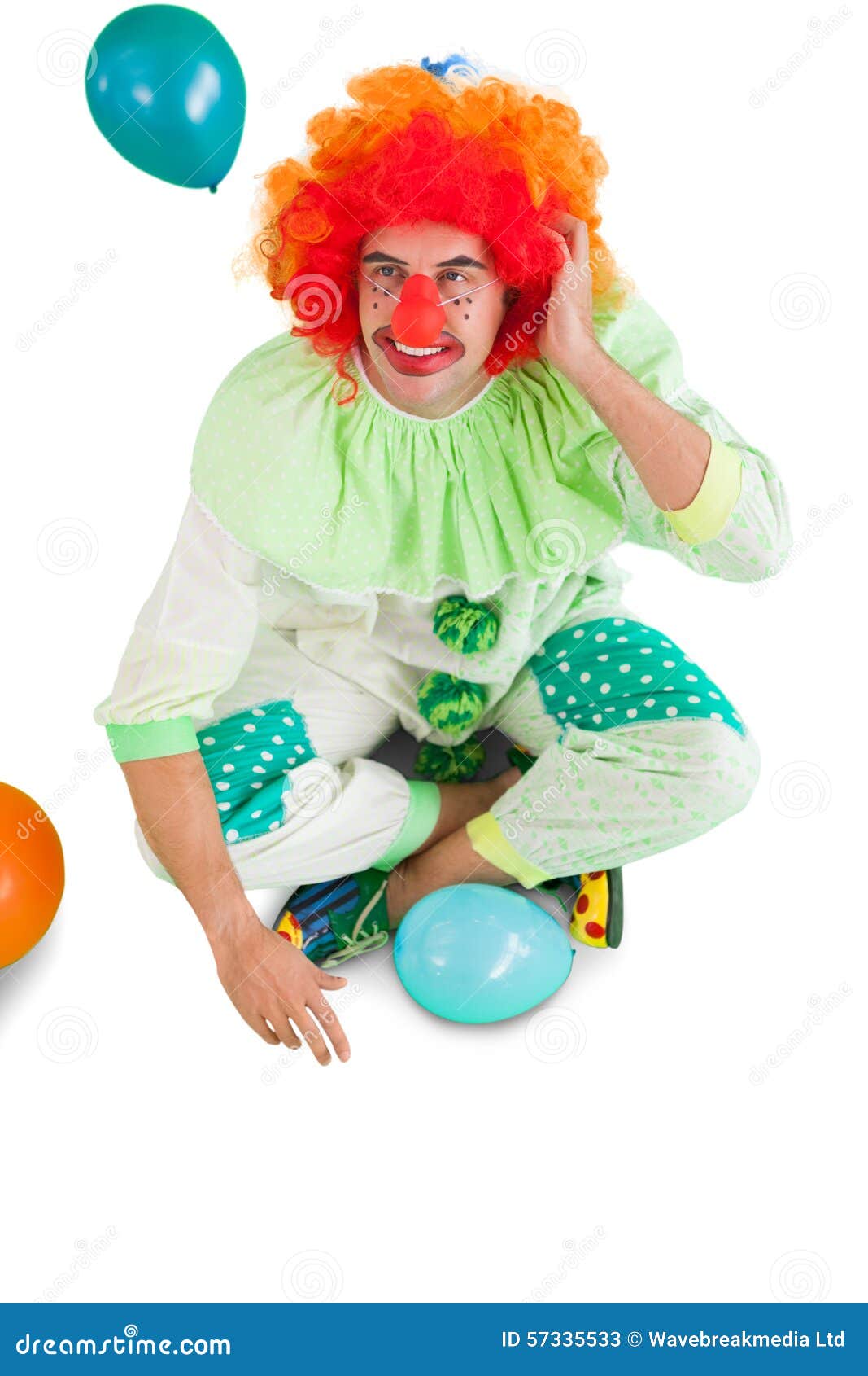 Lustiger Clown, Der Auf Boden Sitzt Stockbild - Bild von kostüm, mann ...