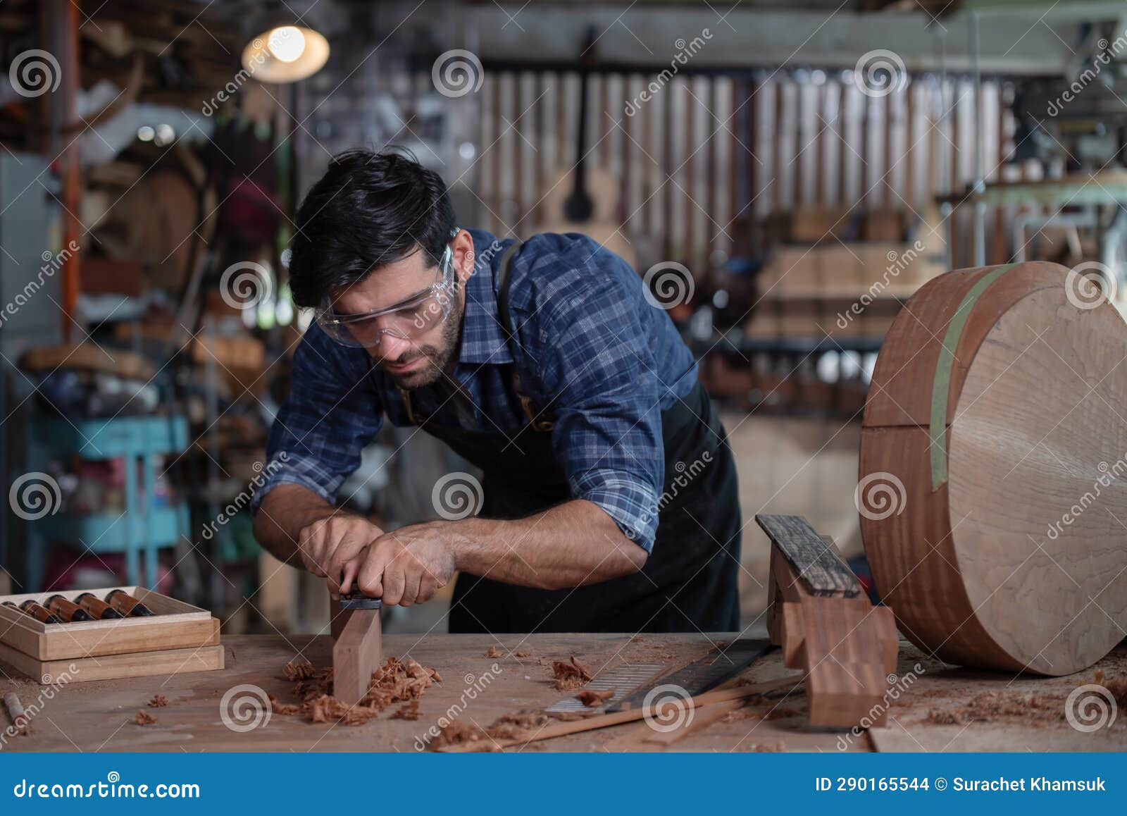 Luthier Creating a Guitar and Using Tools in a Traditional Stock Photo ...