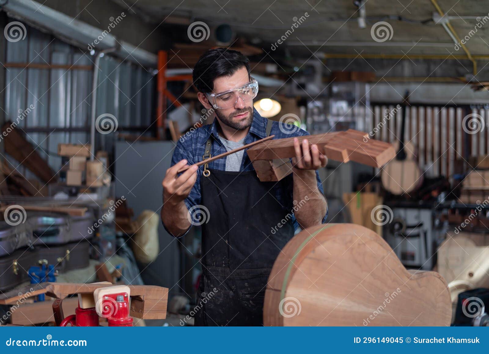 Luthier is Working on the Neck of a Classical Guitar Stock Image ...