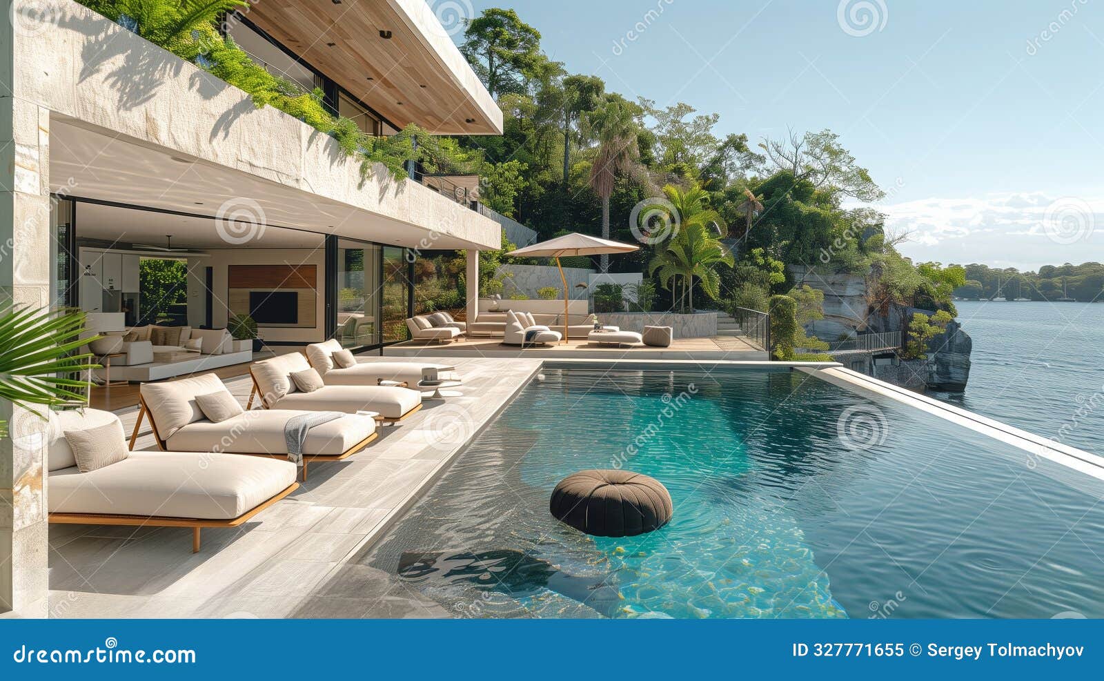 Modern Luxury Home with Infinity Pool Overlooking Water Stock Image ...