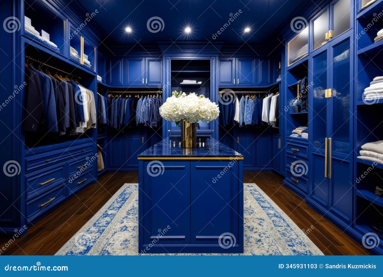 A Luxurious, Sophisticated Walk-in Closet with a Deep Blue Color Scheme ...