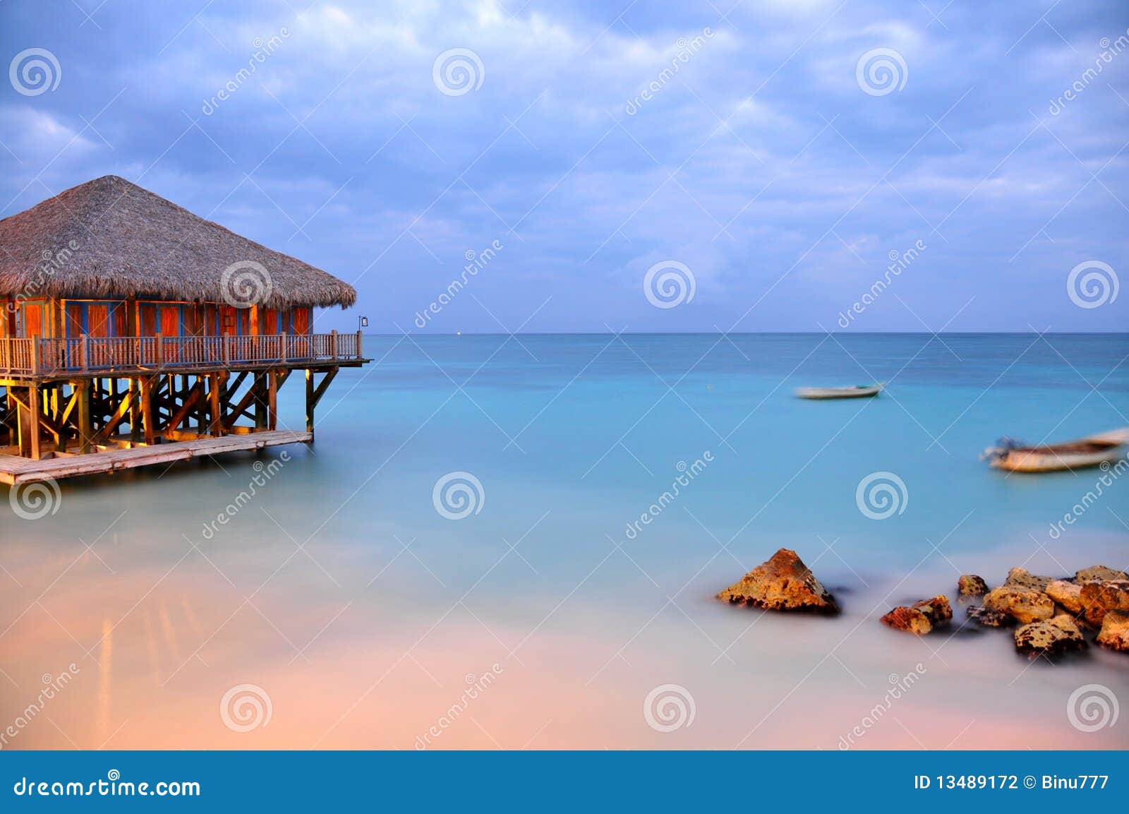 Luxury beach hut stock photo. Image of thatch, dusk, tourism - 13489172