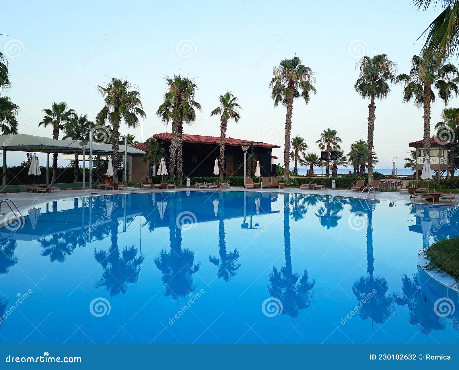 Luxury Blue Swimming Pool at Tropical Resort Stock Photo - Image of ...