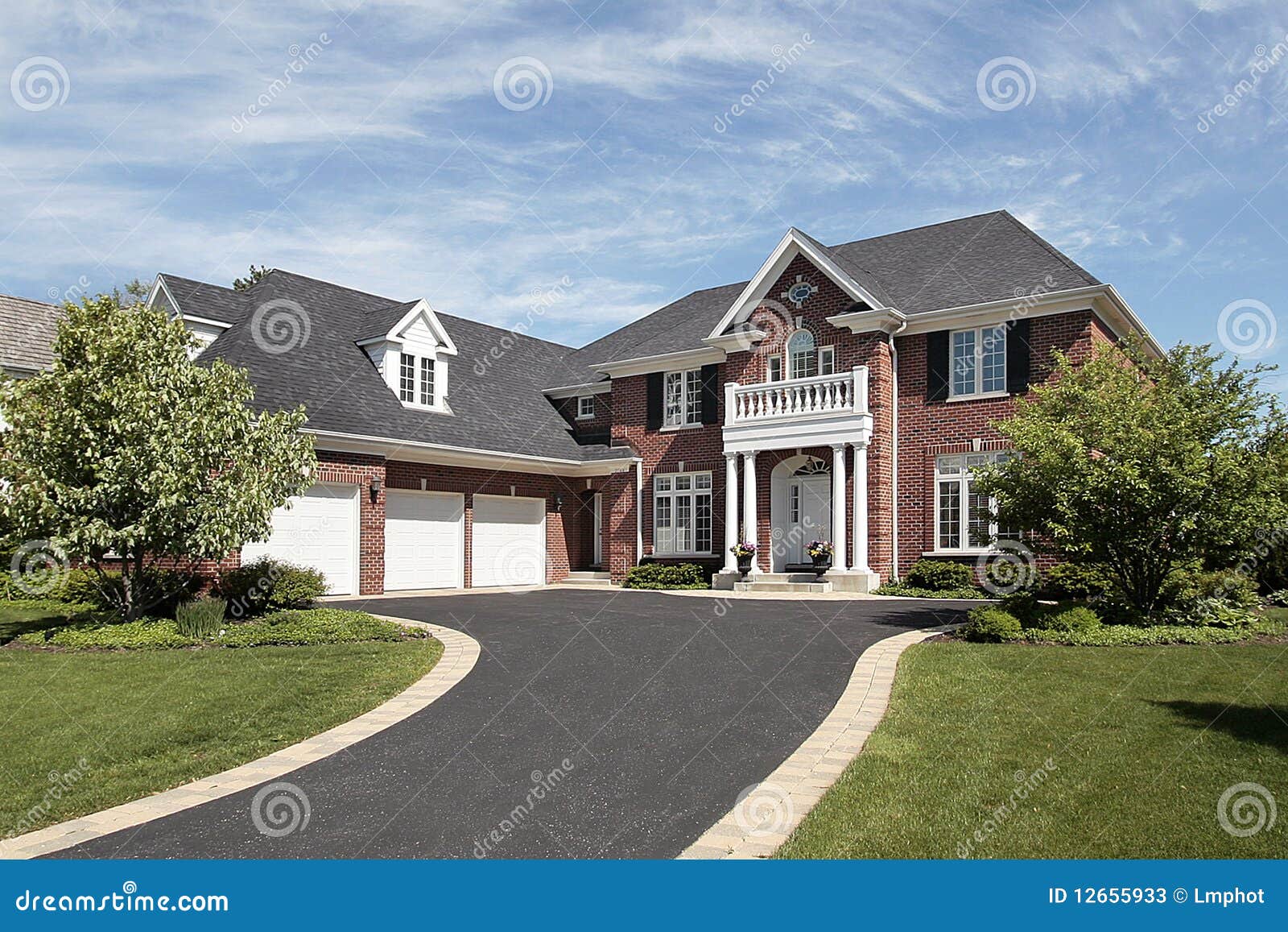 Luxury brick suburban home stock image. Image of dwelling - 12655933