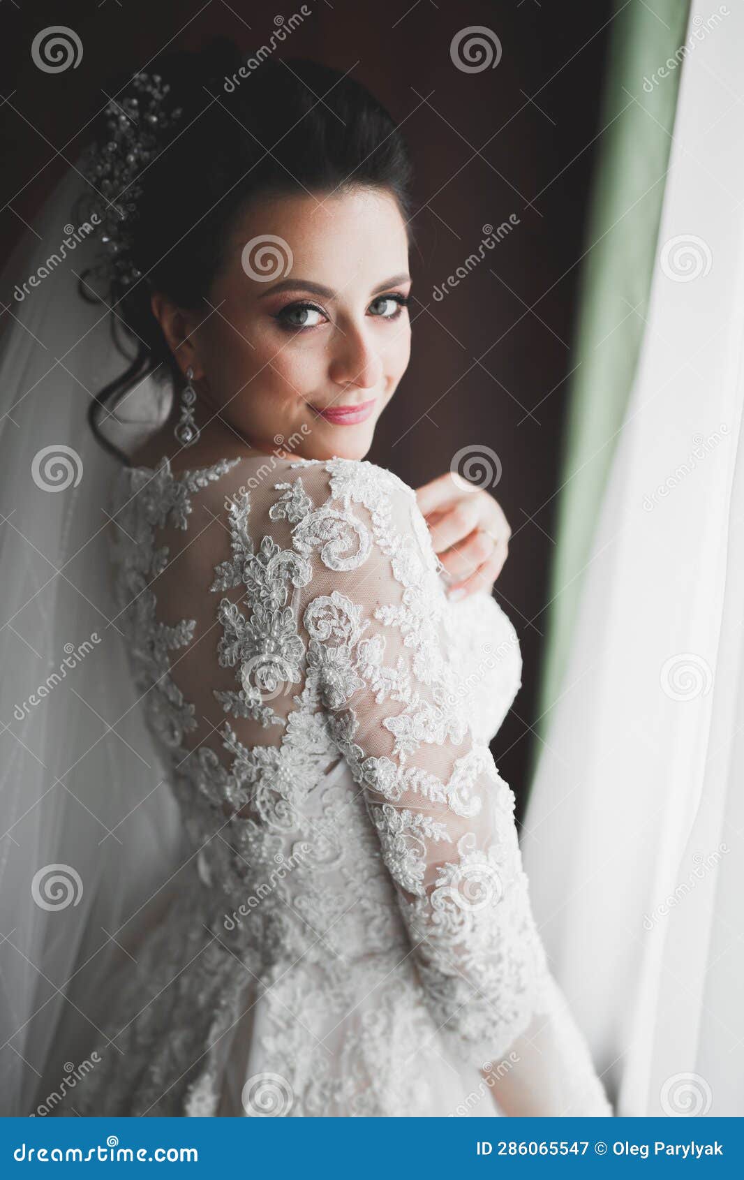 Luxury Bride in White Dress Posing while Preparing for the Wedding ...