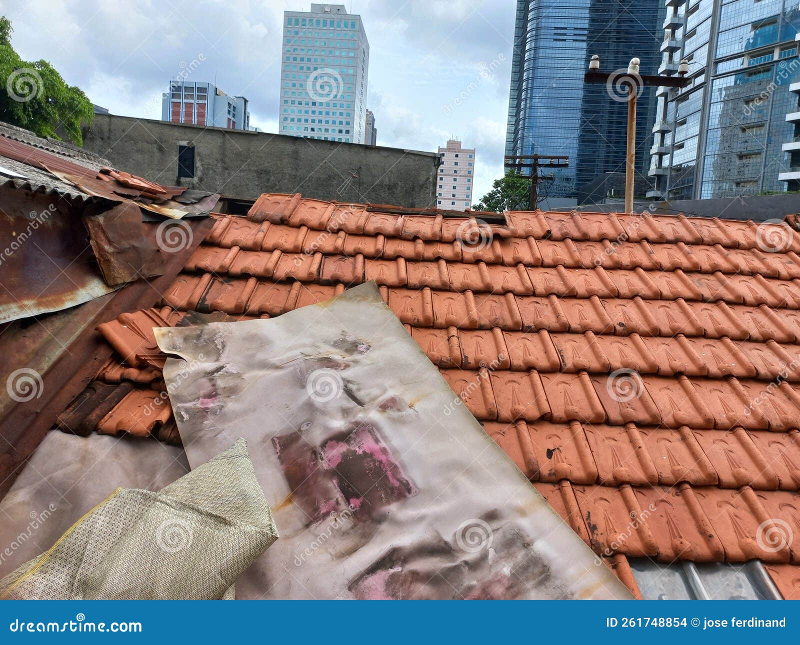 Luxury Buildings and Homes of the Poor Stock Photo - Image of iron ...