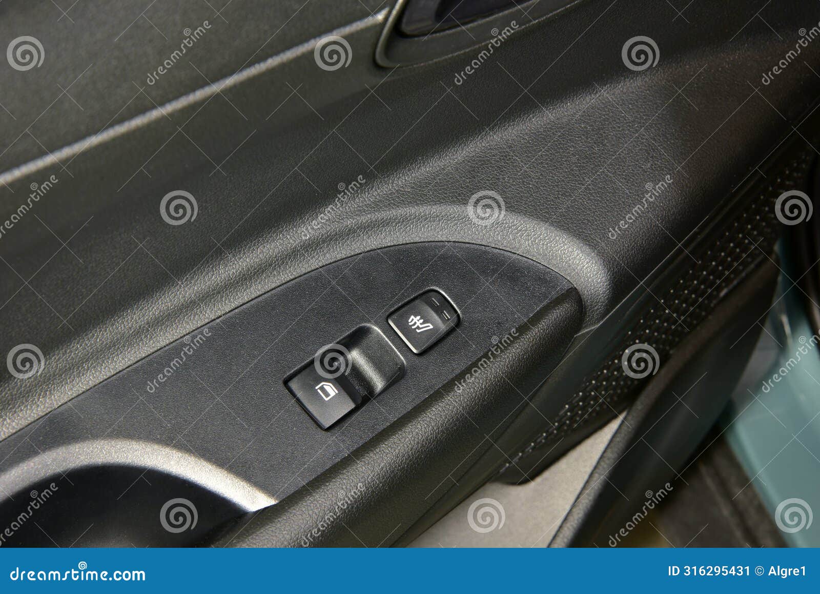 The Button for Raising the Windows and the Button for Heating the Seats ...
