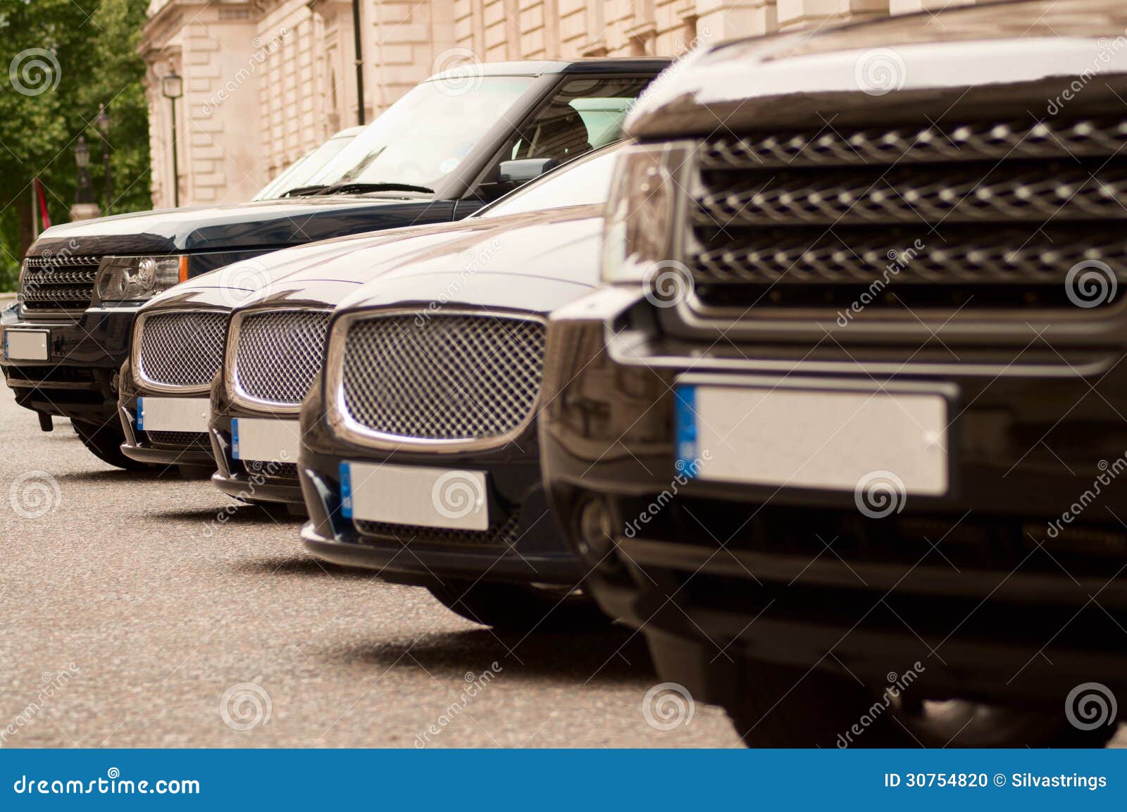 Luxury cars in a row stock photo. Image of driver, transportation ...