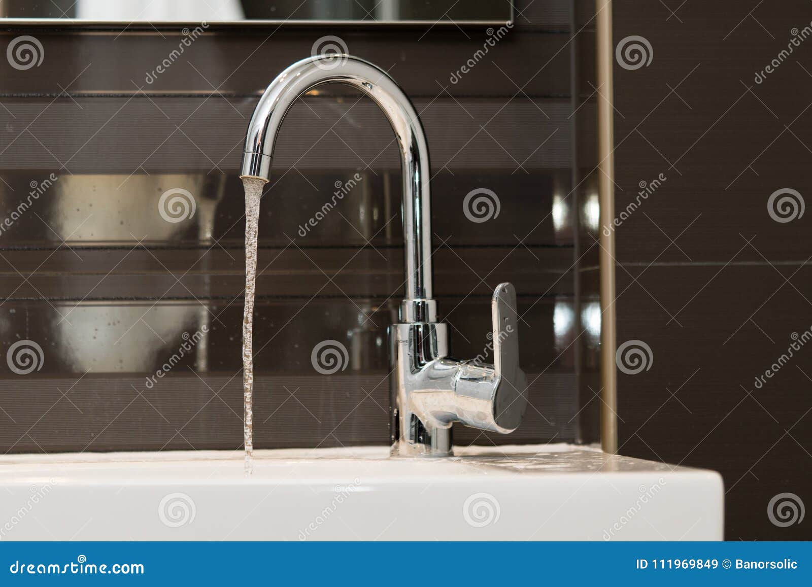 Luxury, Design Water Tap with Flowing Water. Bathroom Equipment Stock ...