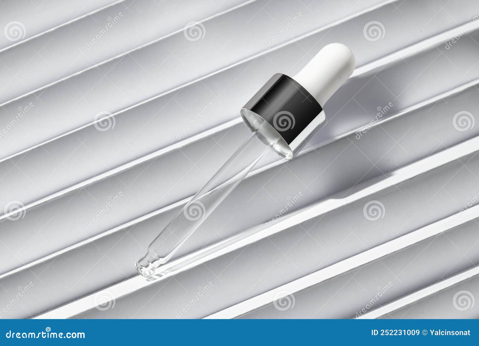 Luxury Empty Dropper on White and Shaded Cascading Background Stock ...