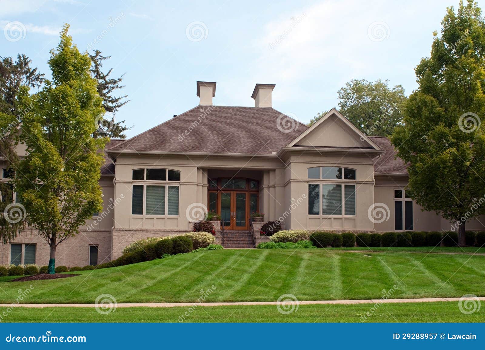 Luxury Home with Two Fireplace Chimneys Stock Image - Image of blue ...