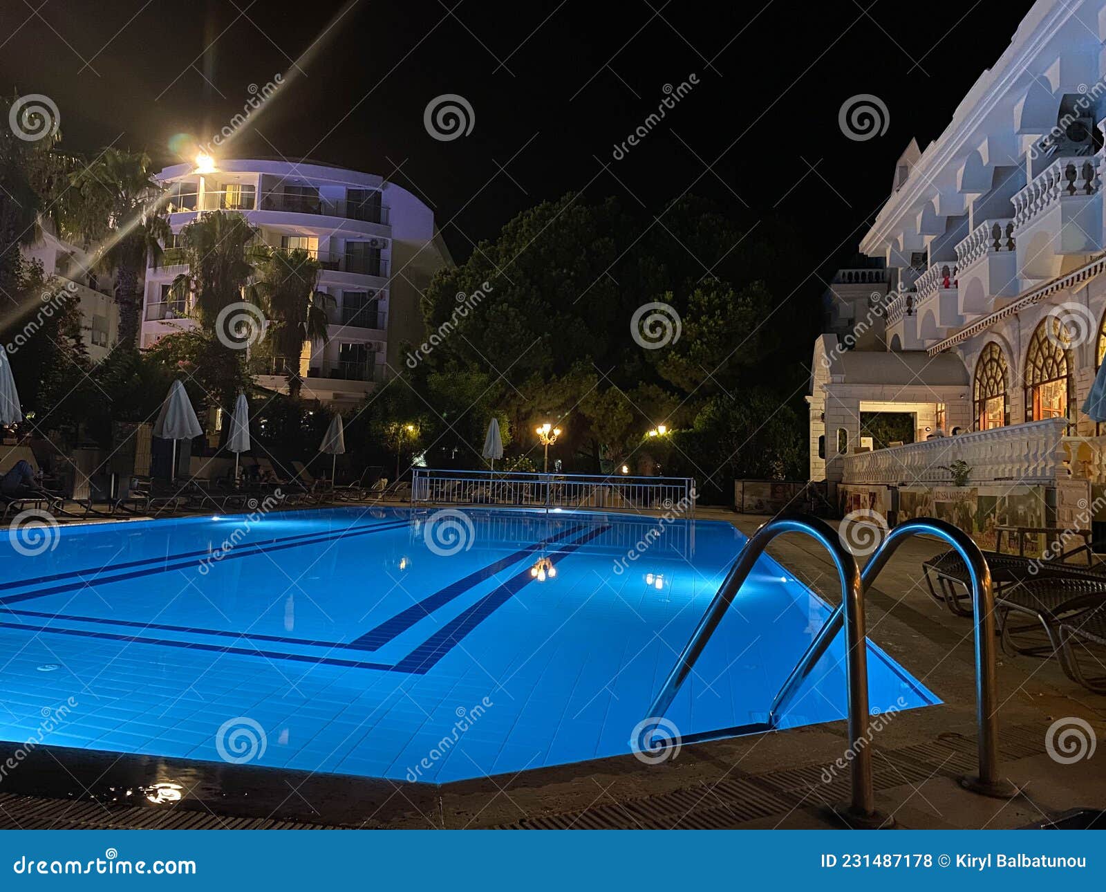 Luxury Hotel with Swimming Pool at Night Stock Photo - Image of light ...