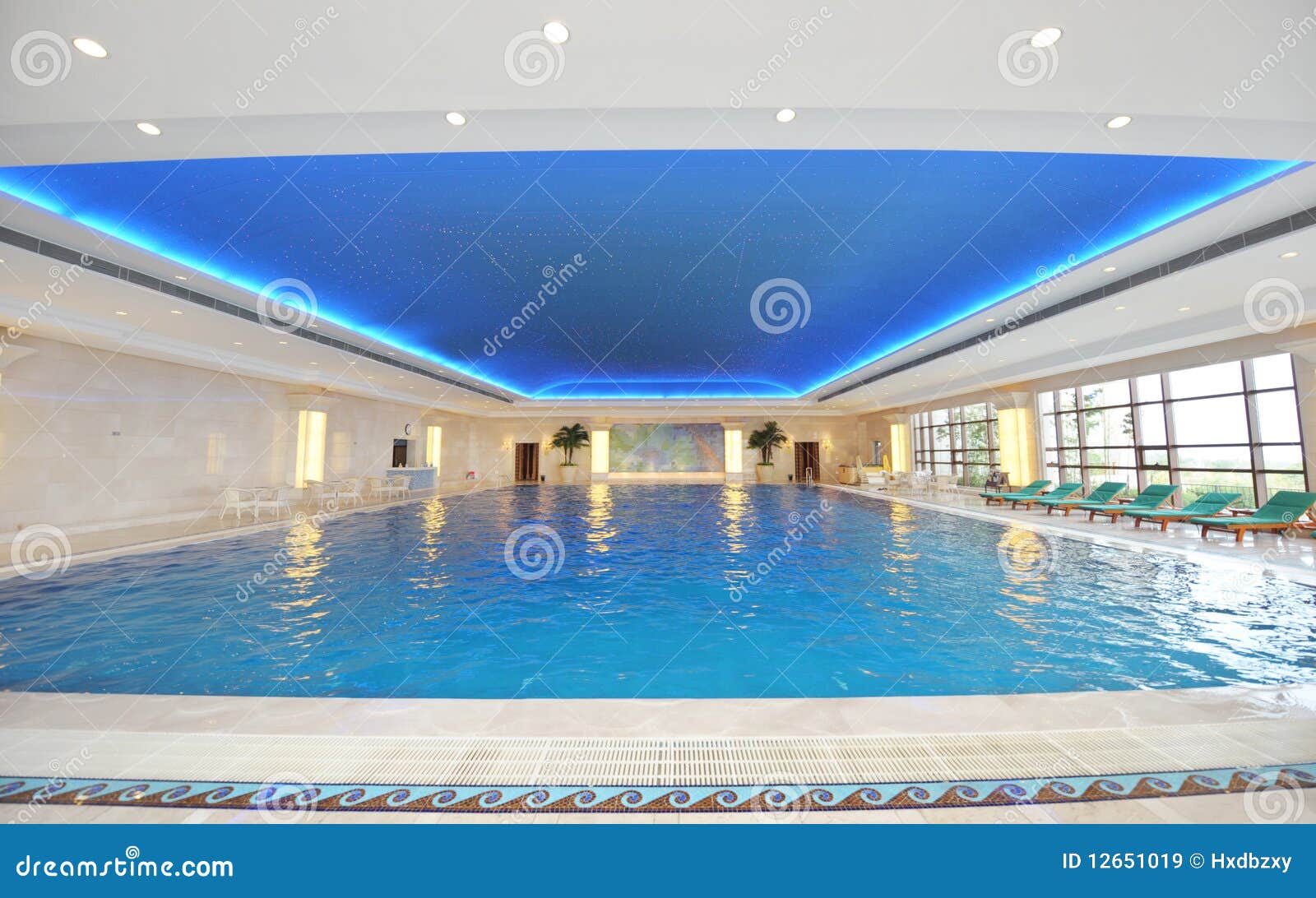 Luxury indoor pool stock image. Image of plants, interior - 12651019