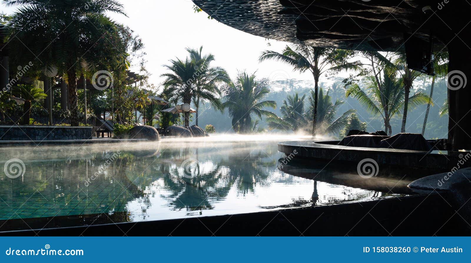 A Luxury Infinity Pool in a Tropical Resort Stock Photo - Image of ...