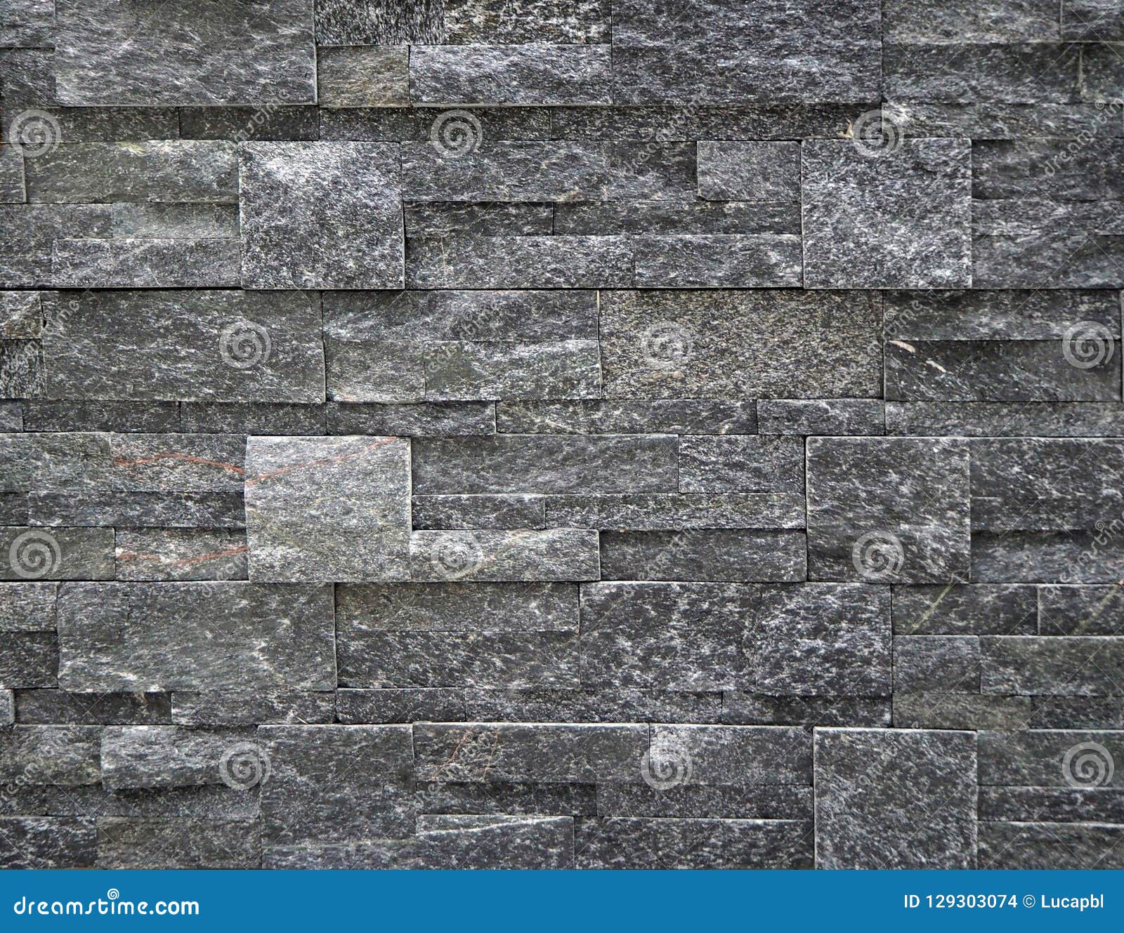 Luxury Interior Wall Cladding Made of Dark Gray Natural Stone. Stock ...