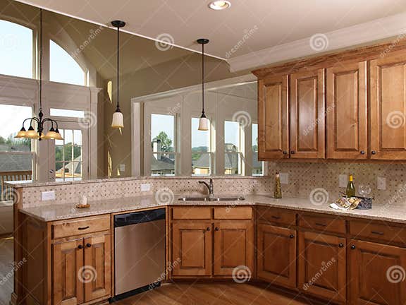 Luxury Model Home Maple Kitchen with Window 2 Stock Image - Image of ...
