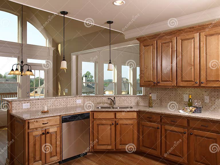Luxury Model Home Maple Kitchen with Window 2 Stock Image - Image of ...