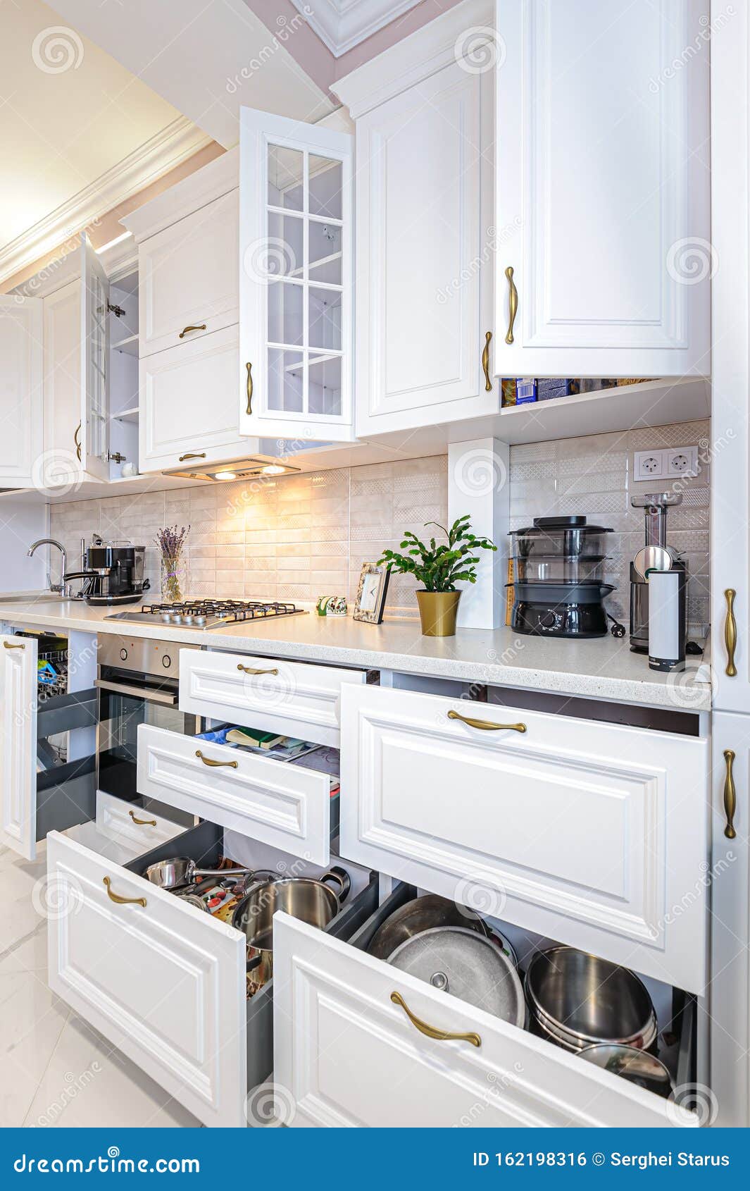 Luxury Modern White Kitchen Interior with Open Doors and Drawers Stock ...