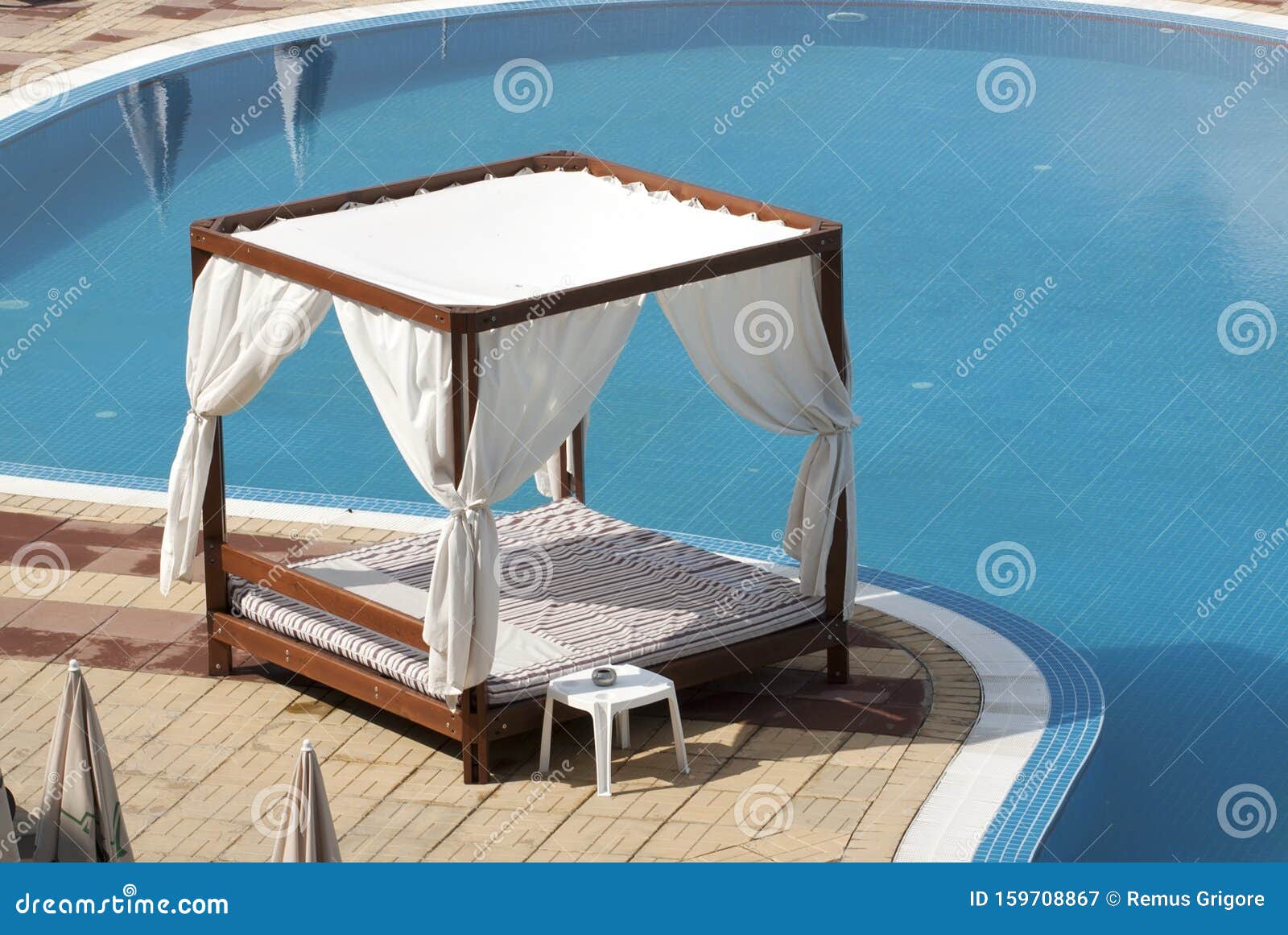 Luxury sunbed at the pool stock image. Image of sunbed - 159708867