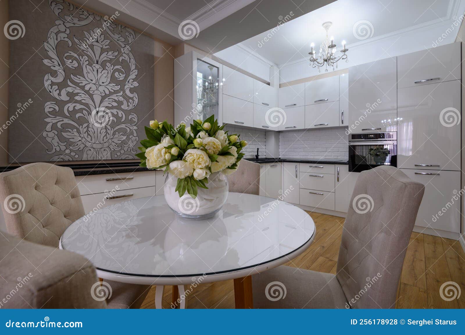 Luxury White Modern Kitchen with Dining Table Stock Photo - Image of ...