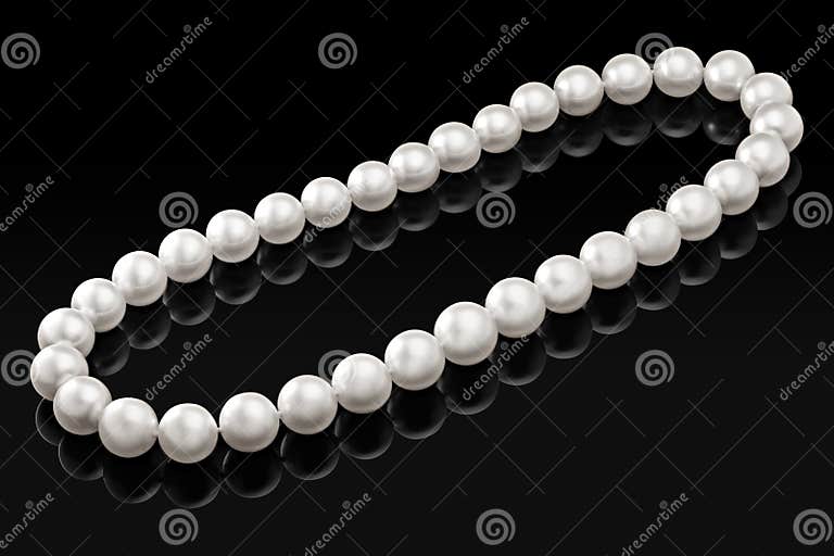 Luxury White Pearl Necklace On A Black Background With Glossy