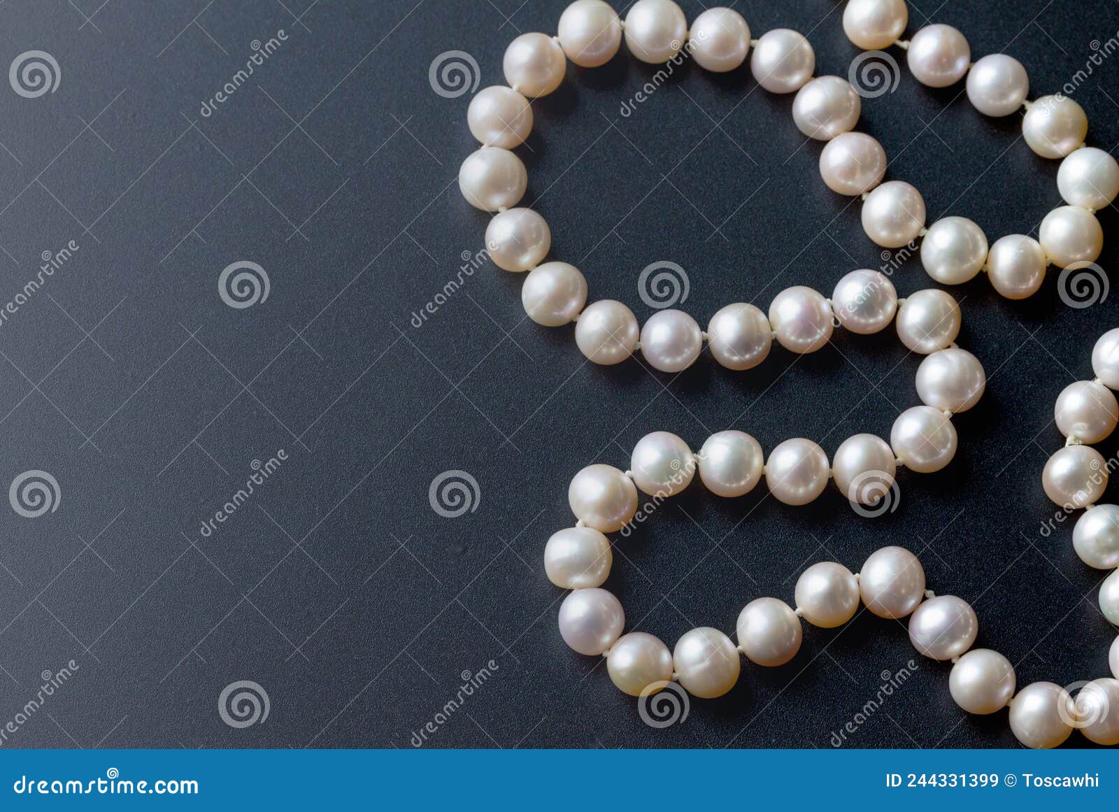 Luxury White Pearl Necklace On A Black Background With Space For Text