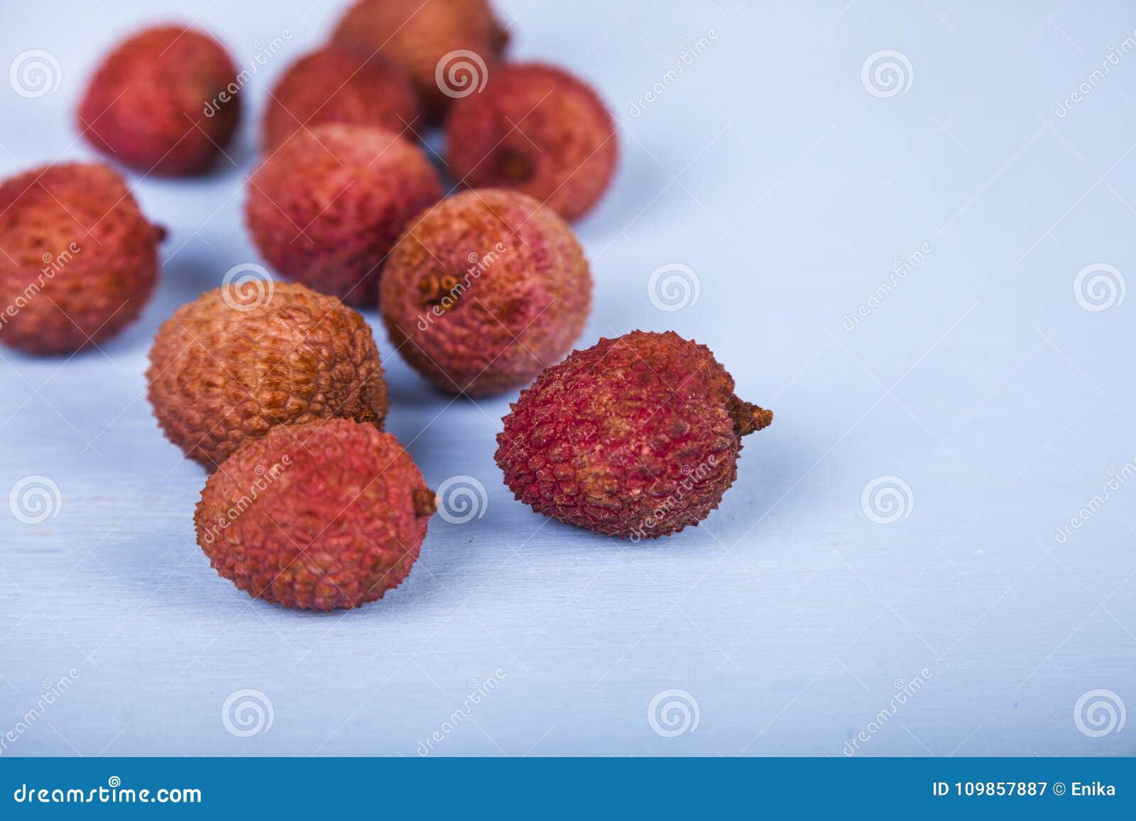 Lychee on a blue table stock image. Image of group, ingredient - 109857887